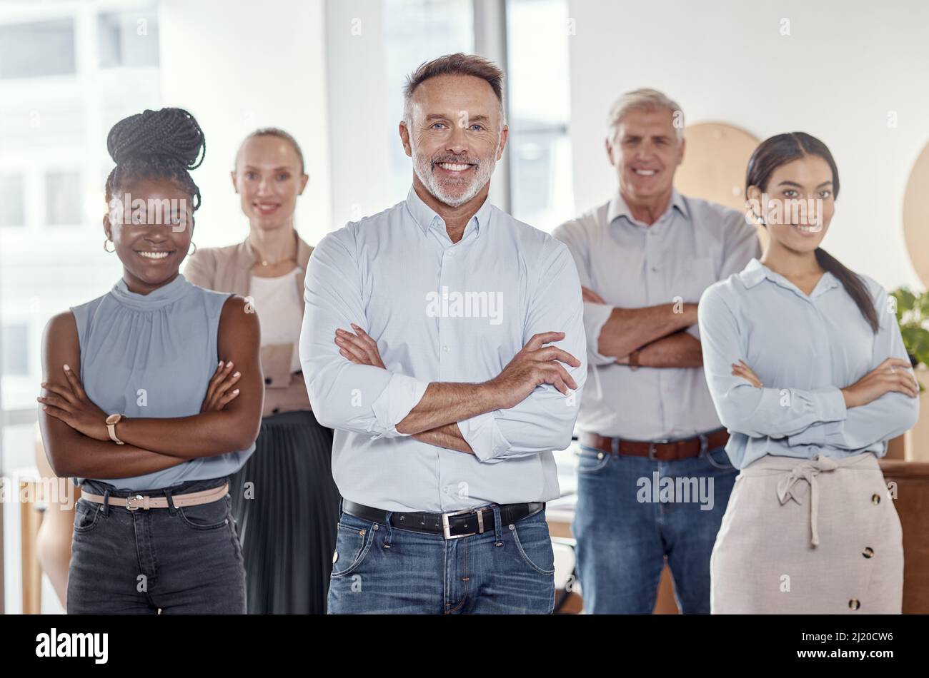 Team commitment makes a company grow. Portrait of a group of confident ...