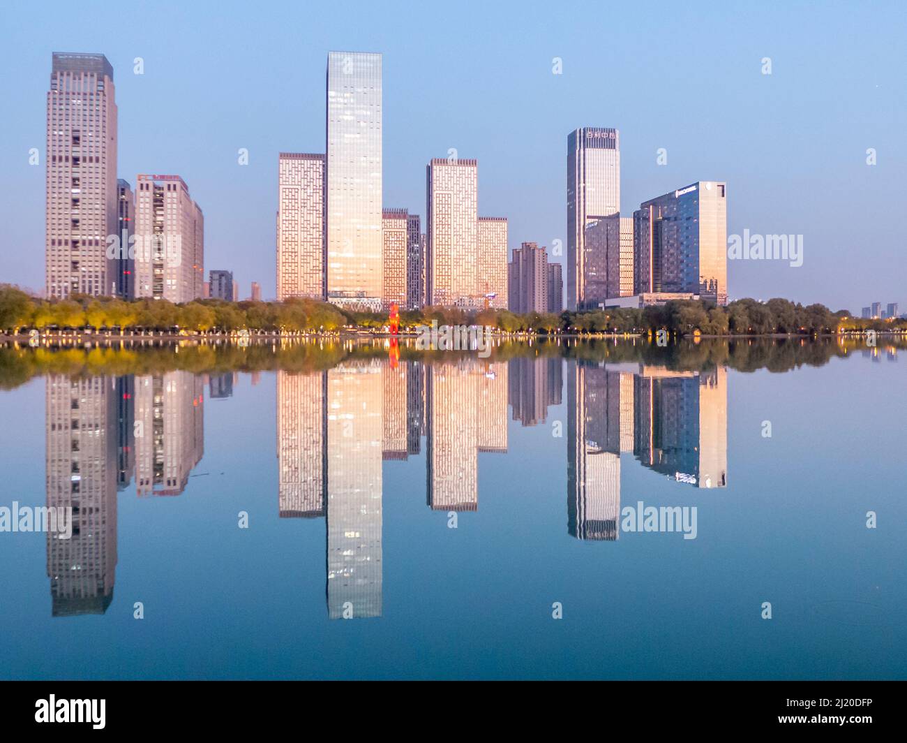 Symmetrical city on the horizon Stock Photo - Alamy
