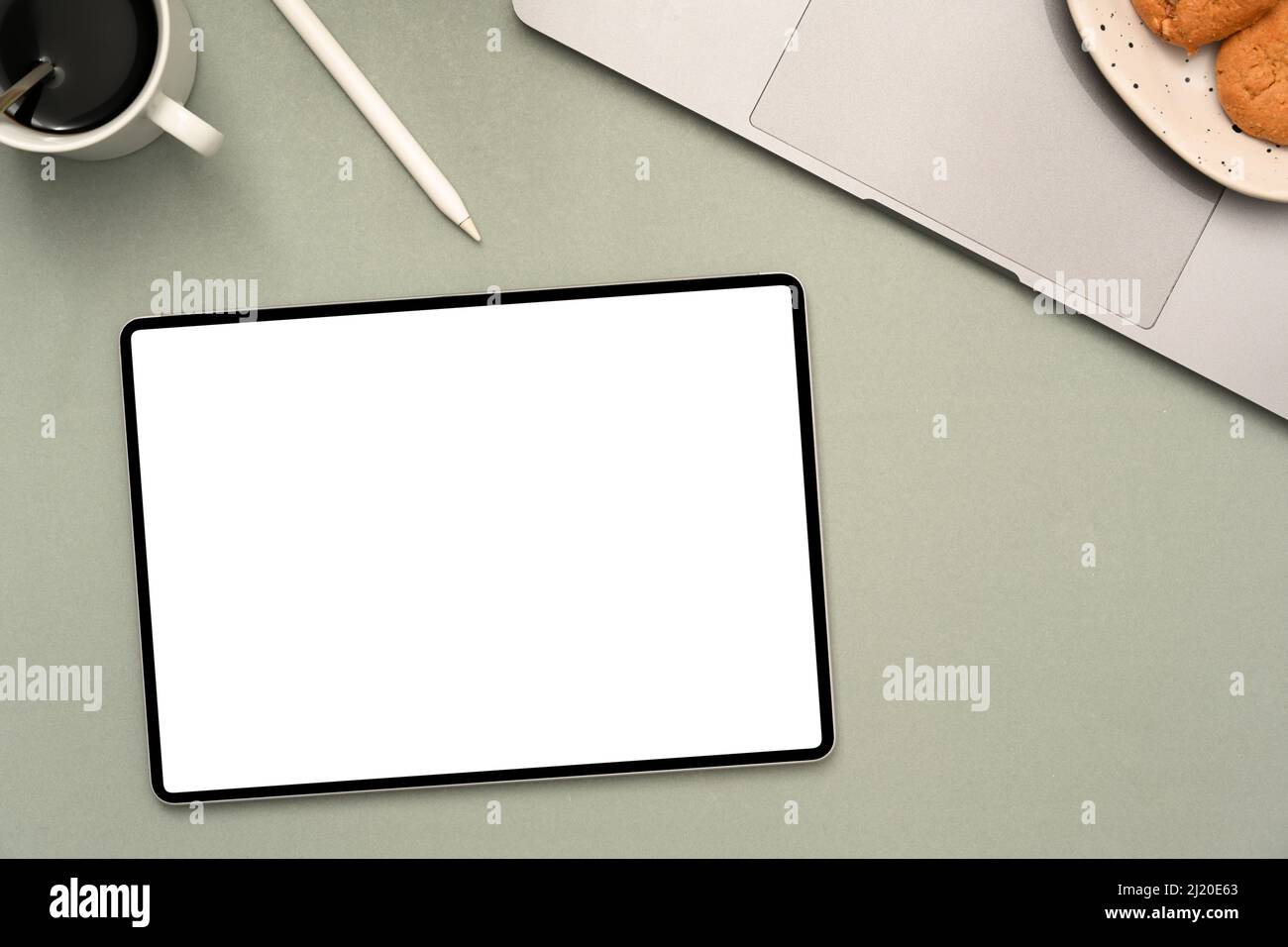 Modern office desk with digital tablet computer white screen mockup ...