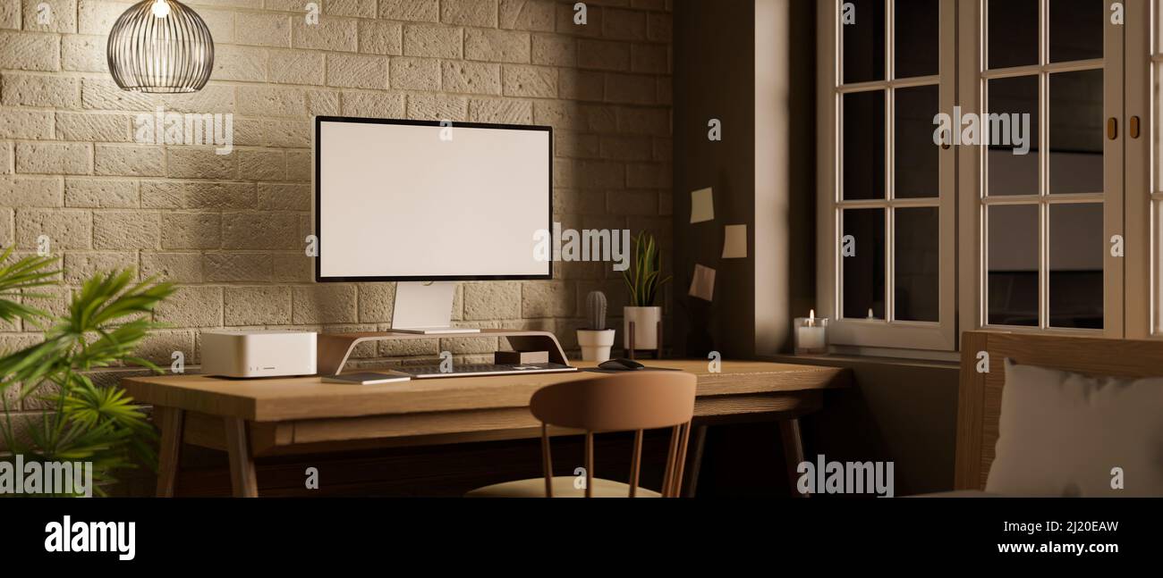 Contemporary loft workspace at night interior design with computer ...