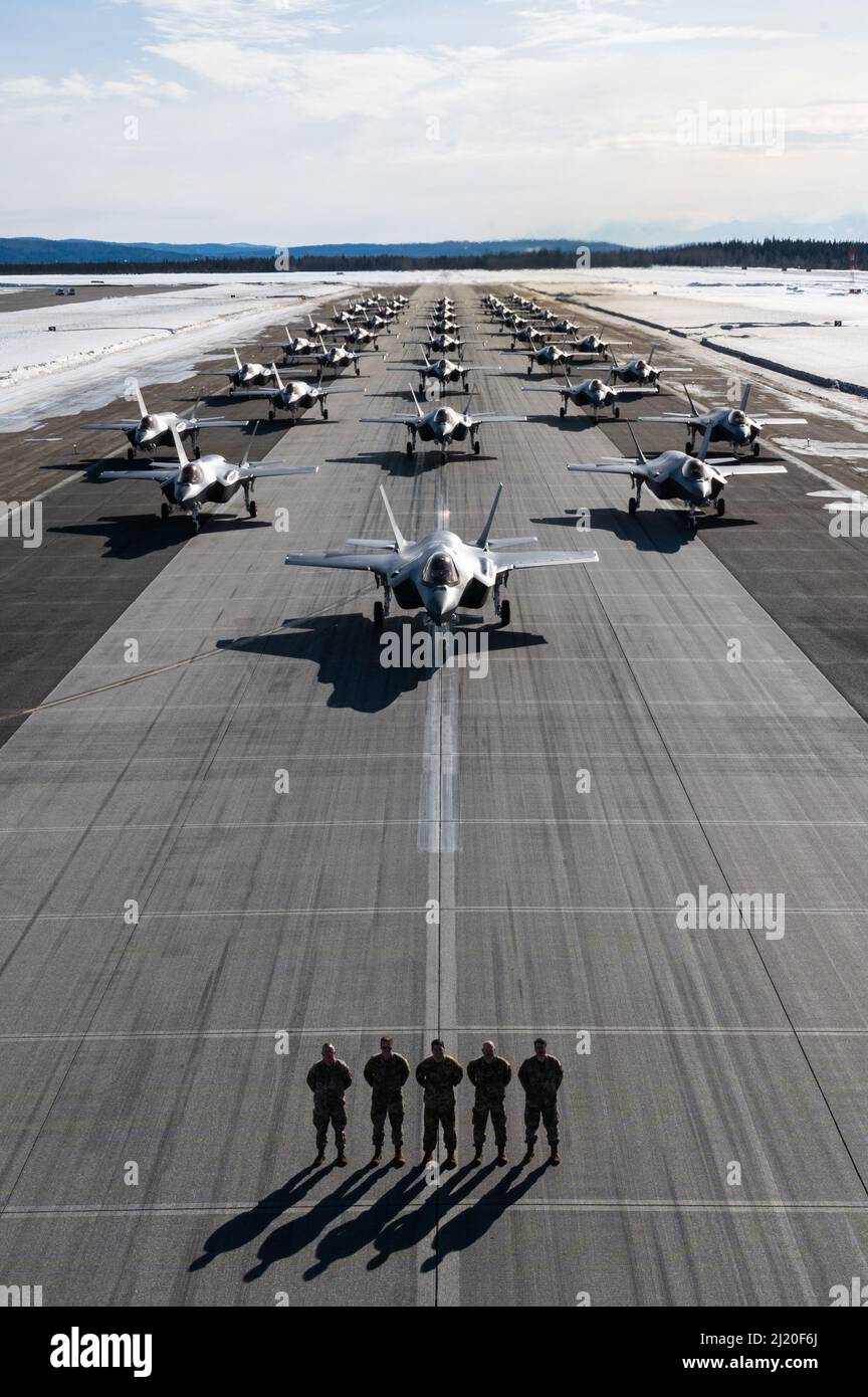 Leadership assigned to the 354th Fighter Wing (FW) pose in front of a ...