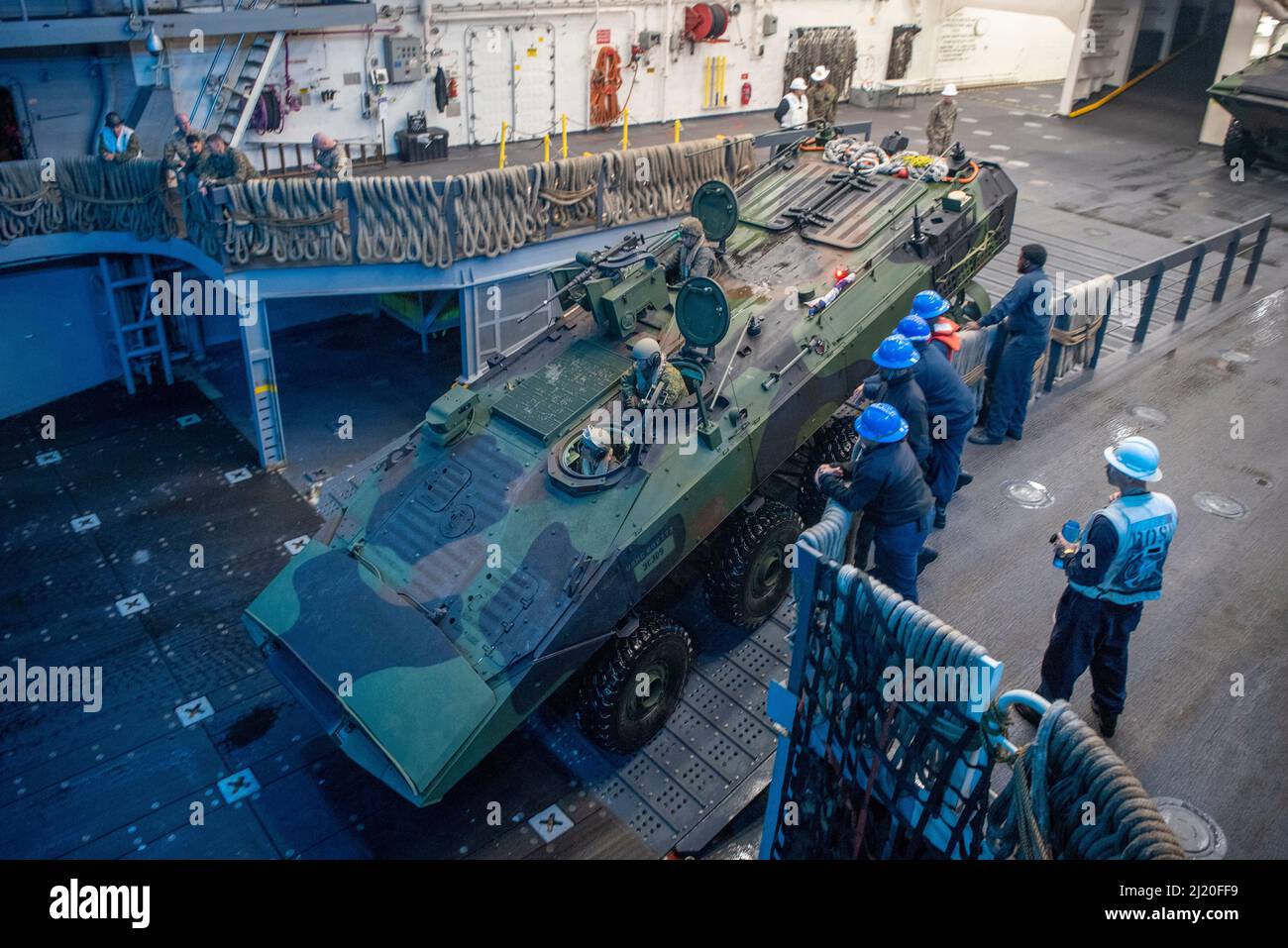 U.S. Navy Sailors assigned to amphibious transport dock USS Anchorage ...