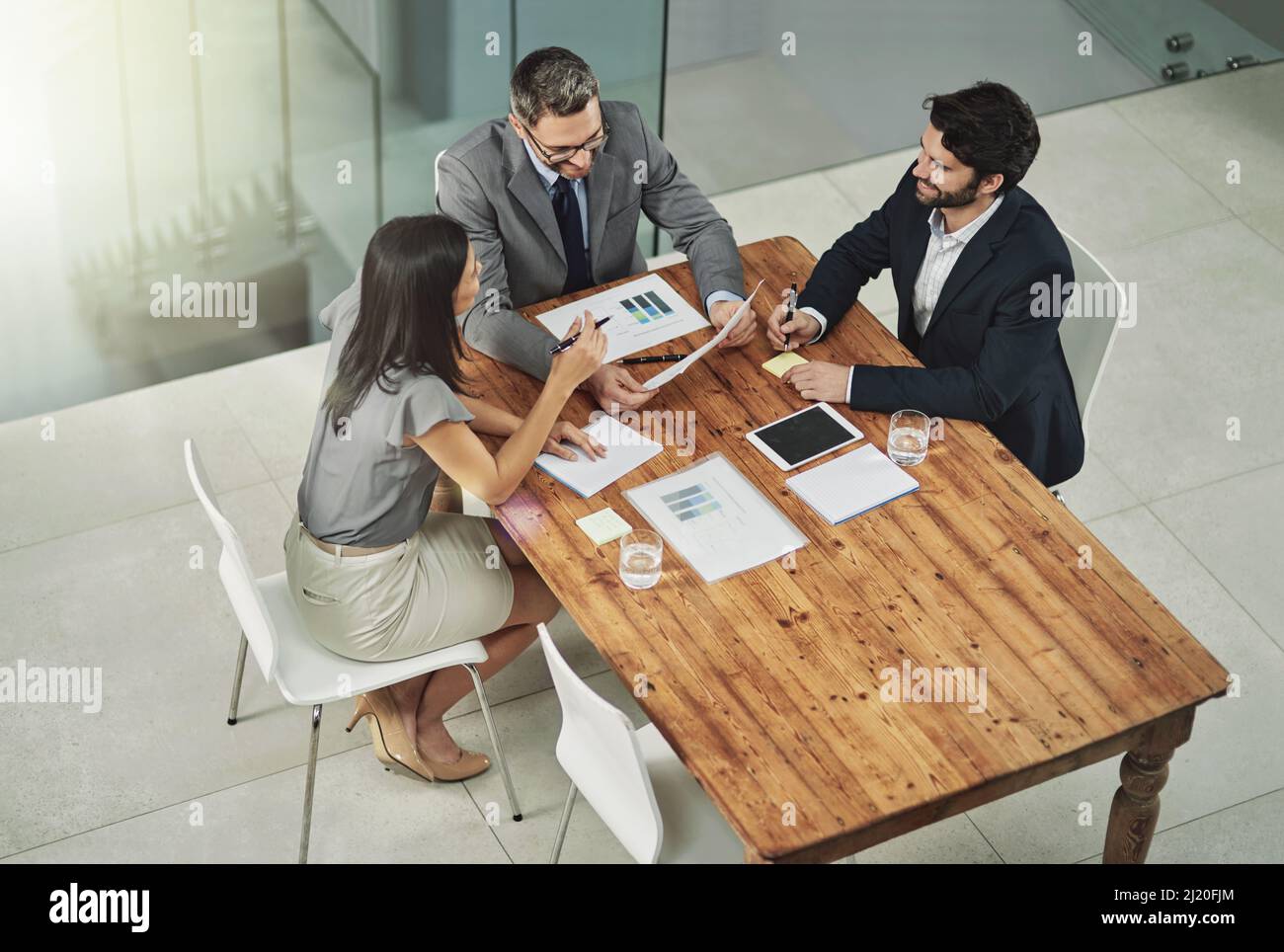 Three men one woman talking hi-res stock photography and images - Alamy