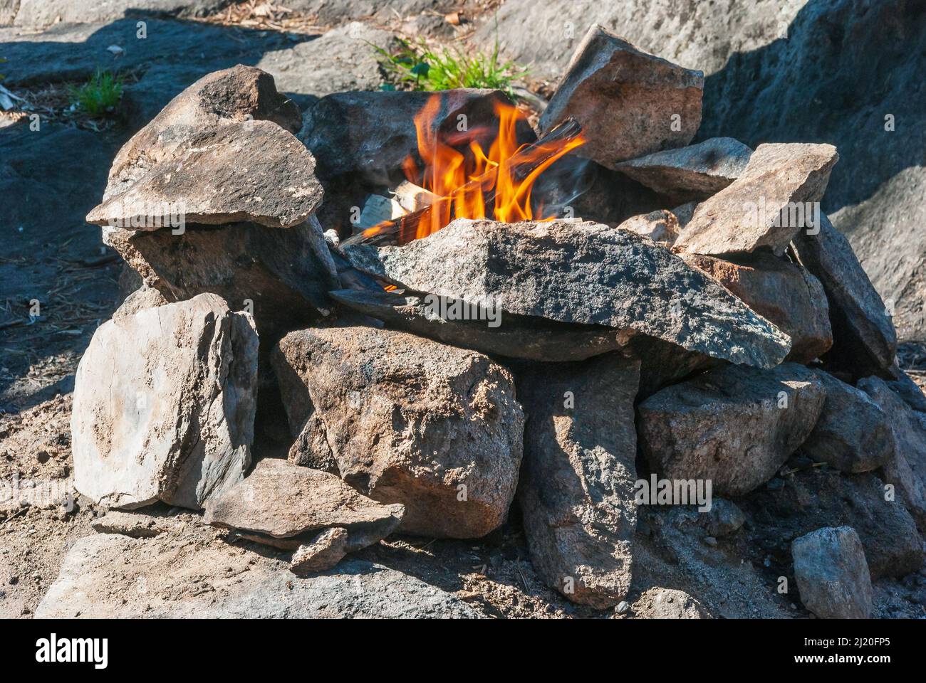 Pile of stones around campfire in Evo Lammi Finland Stock Photo - Alamy