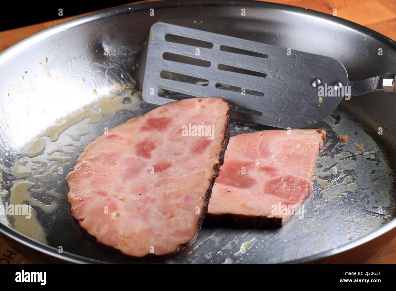 Frying Slices of Ham on Cooking Pan Stock Photo - Alamy Frying Slices of Ham on Cooking Pan Stock Photo - Alamy