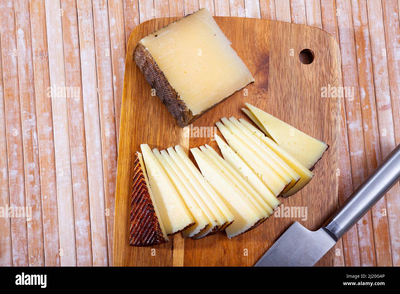 Sliced italian cured sheep cheese Pecorino Stock Photo - Alamy