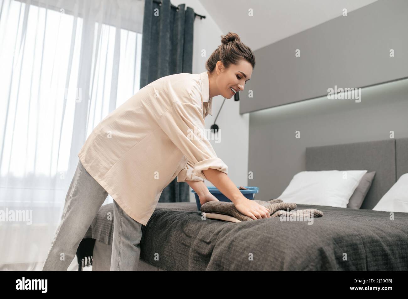 Woman doing housework hi-res stock photography and images - Alamy