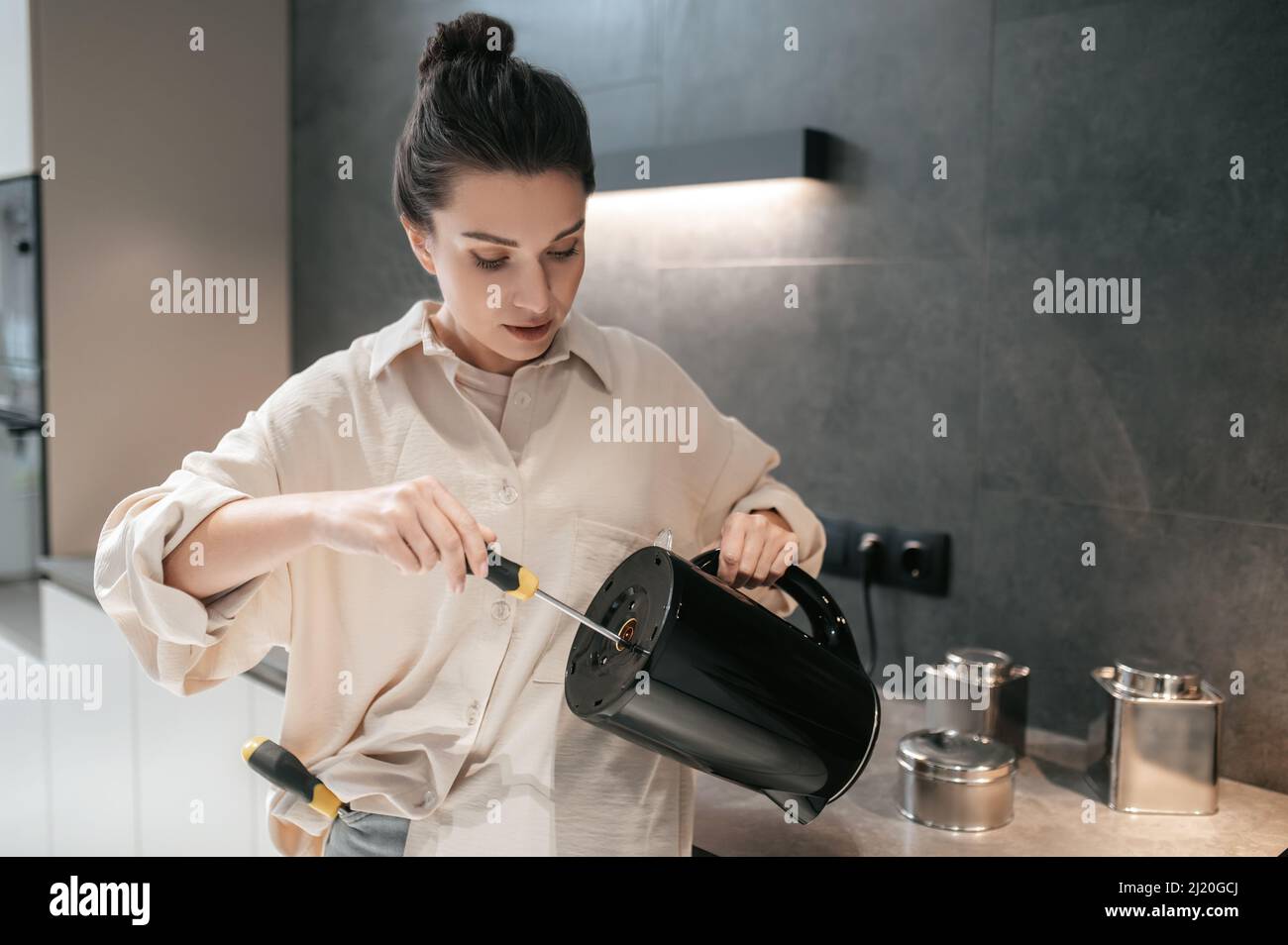 Broken kettle hi-res stock photography and images - Alamy