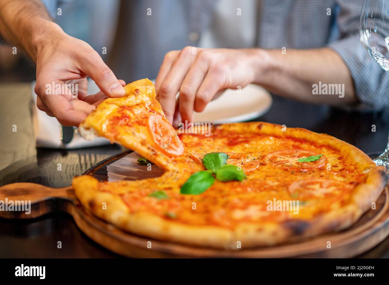 Taking a slice hi-res stock photography and images - Alamy