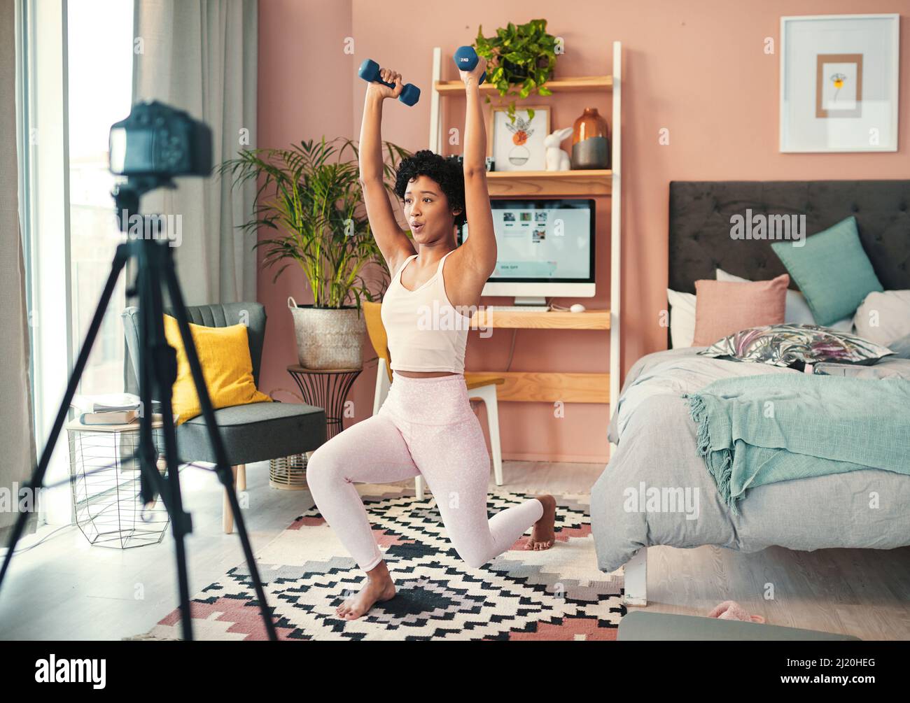 Documenting her transformative fitness journey. Shot of a young woman ... Documenting her transformative fitness journey. Shot of a young woman ...
