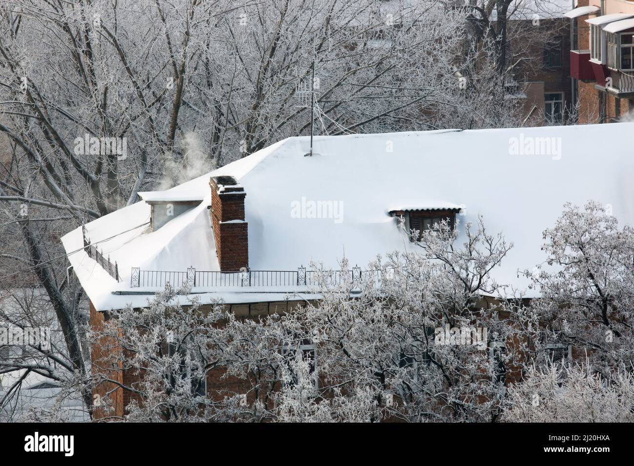 Winter landscape with roof house covered with snow Stock Photo - Alamy