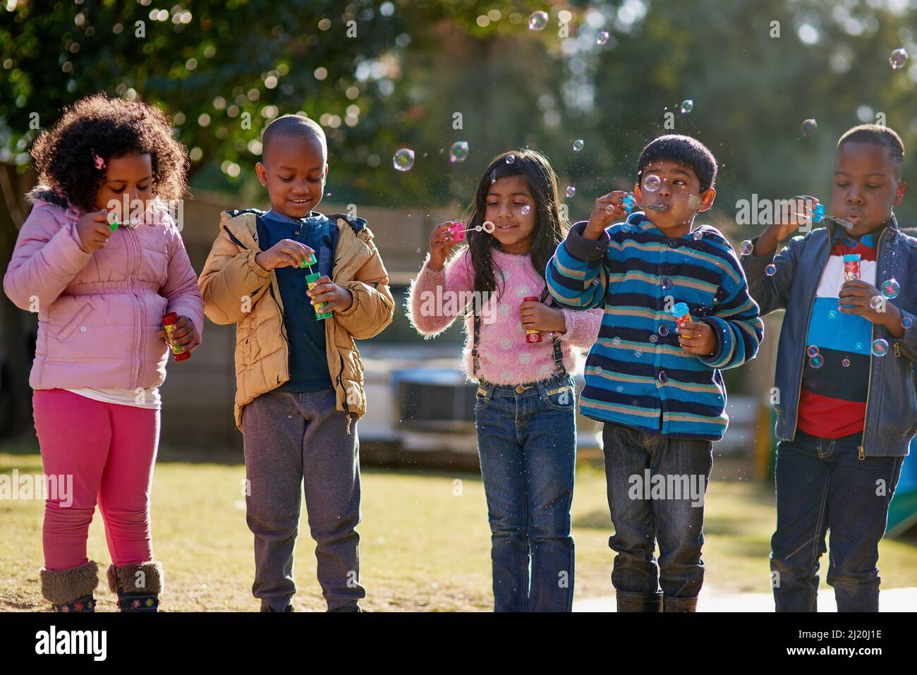 Child Blowing Bubbles