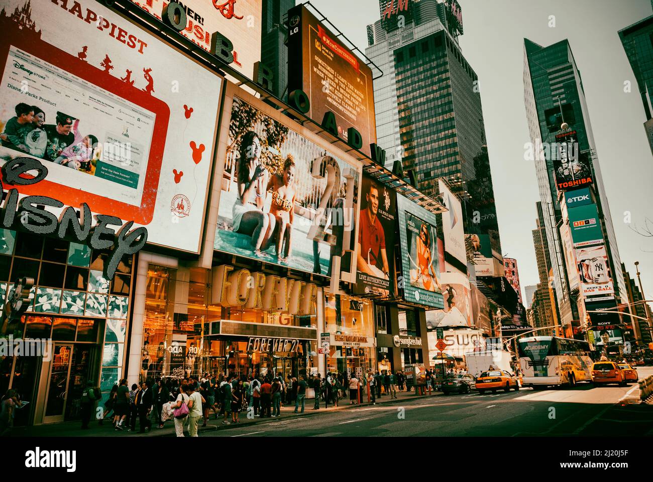 Electronic advertising billboards lining sides of the buildings on ...