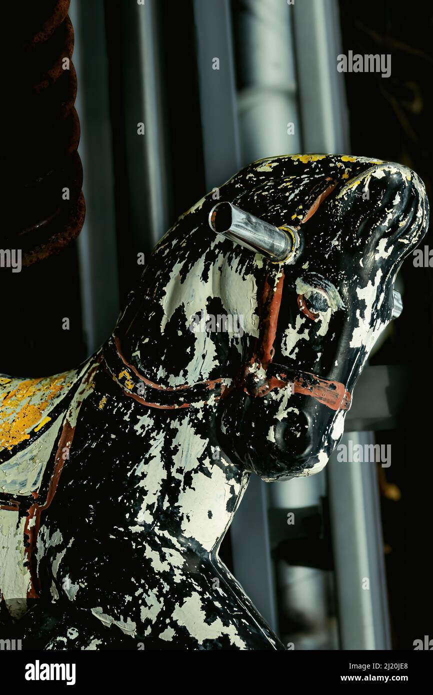 Rusty old playground swing in the trash Stock Photo - Alamy
