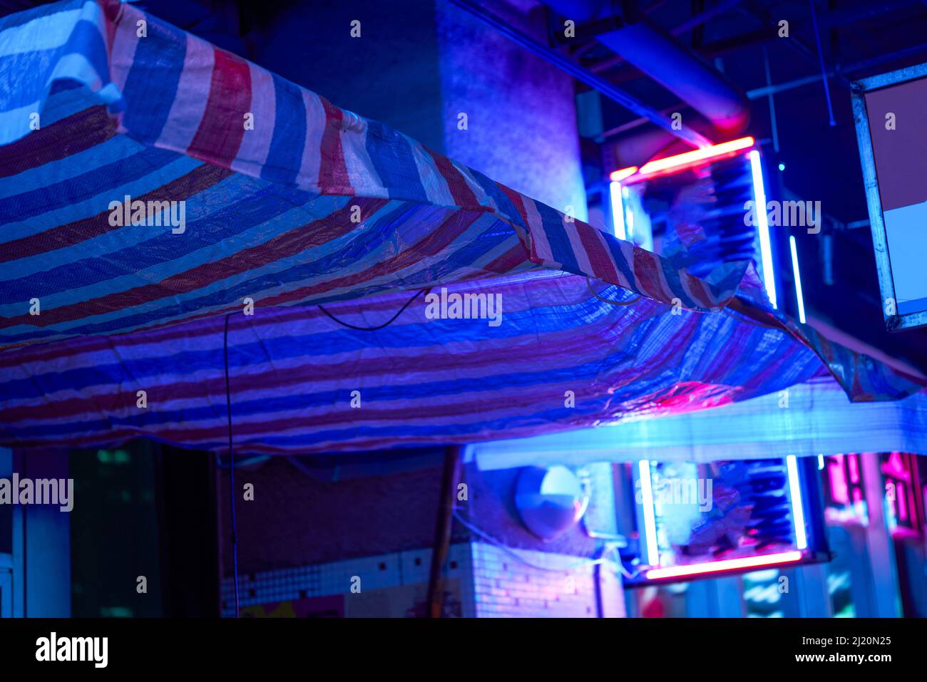 Red and blue canopy for outdoor use in urban villages in China Stock ...
