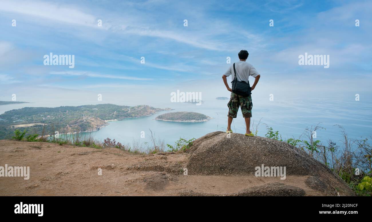 Alone happy man photographer or traveler standing and thinking ...