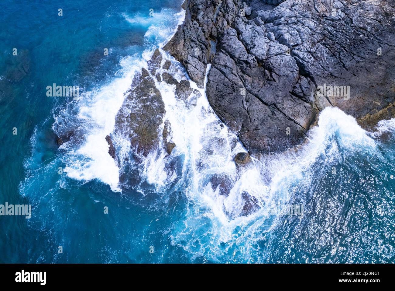 Aerial view Top down seashore big wave crashing on rock cliff Beautiful ...