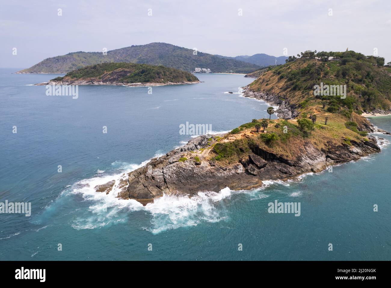Aerial view phuket seashore Wave crashing on rocks at Laem promthep ...