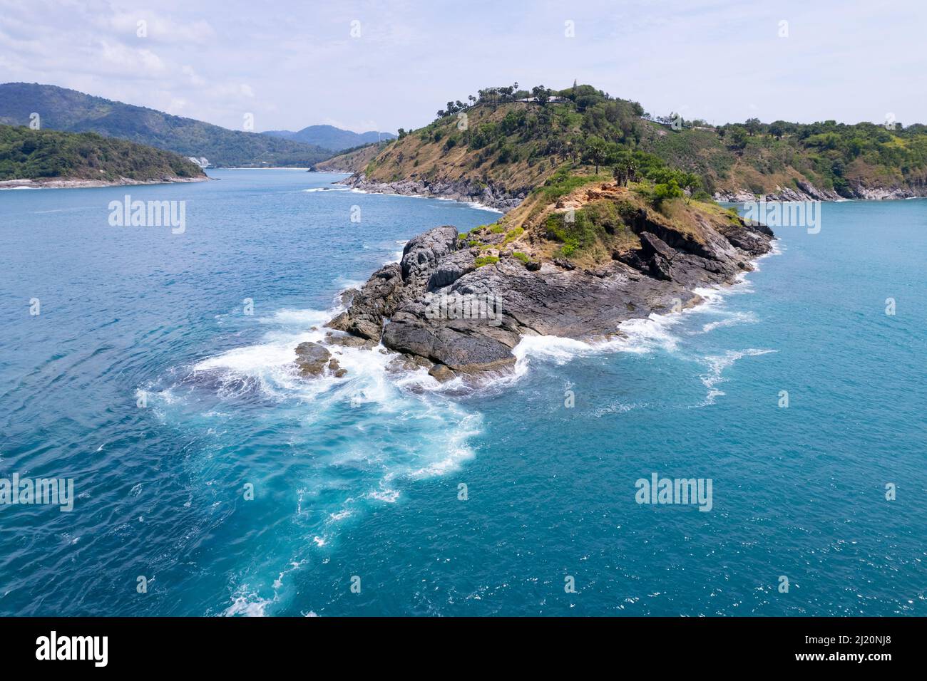 Aerial view phuket seashore Wave crashing on rocks at Laem promthep ...