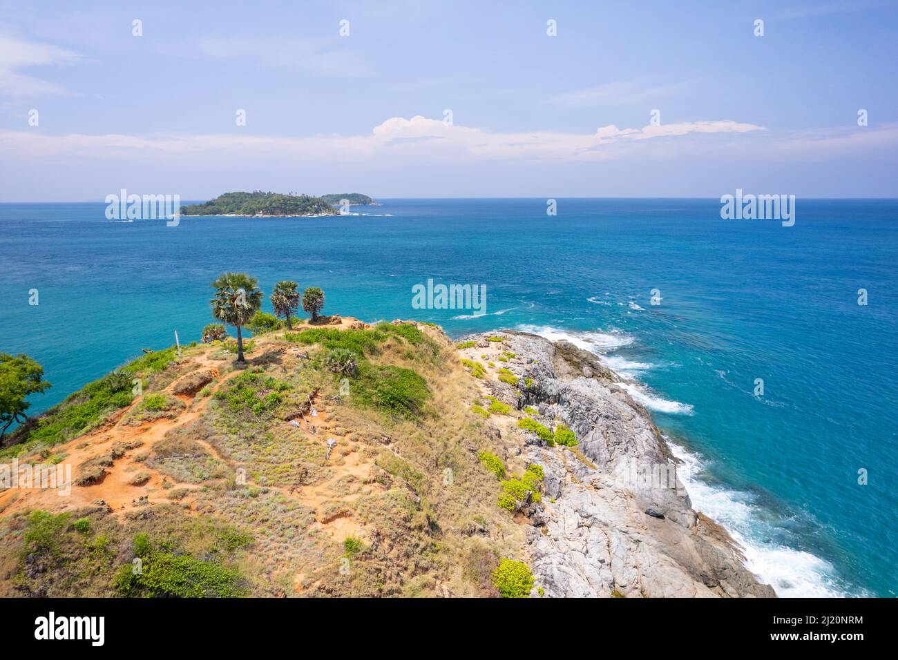 Aerial view phuket seashore Wave crashing on rocks at Laem promthep ...
