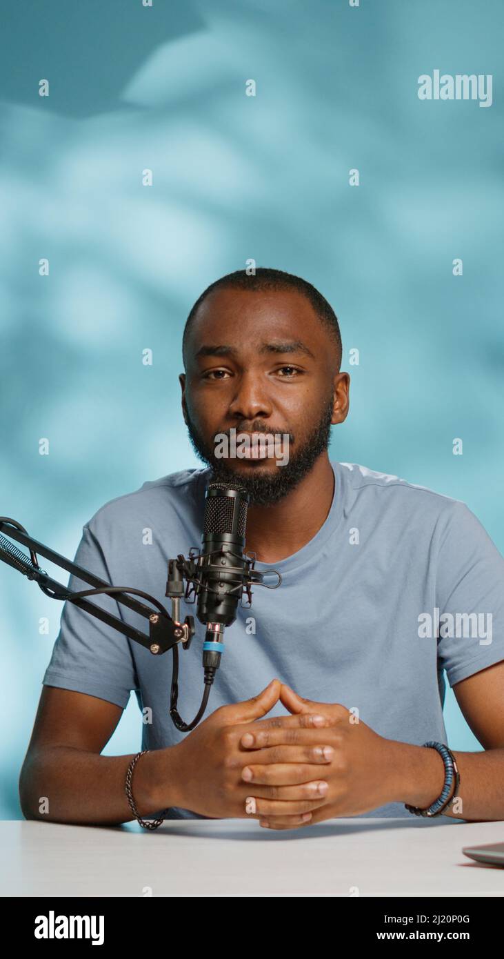 POV of influencer recording video for vlog channel, using microphone ...