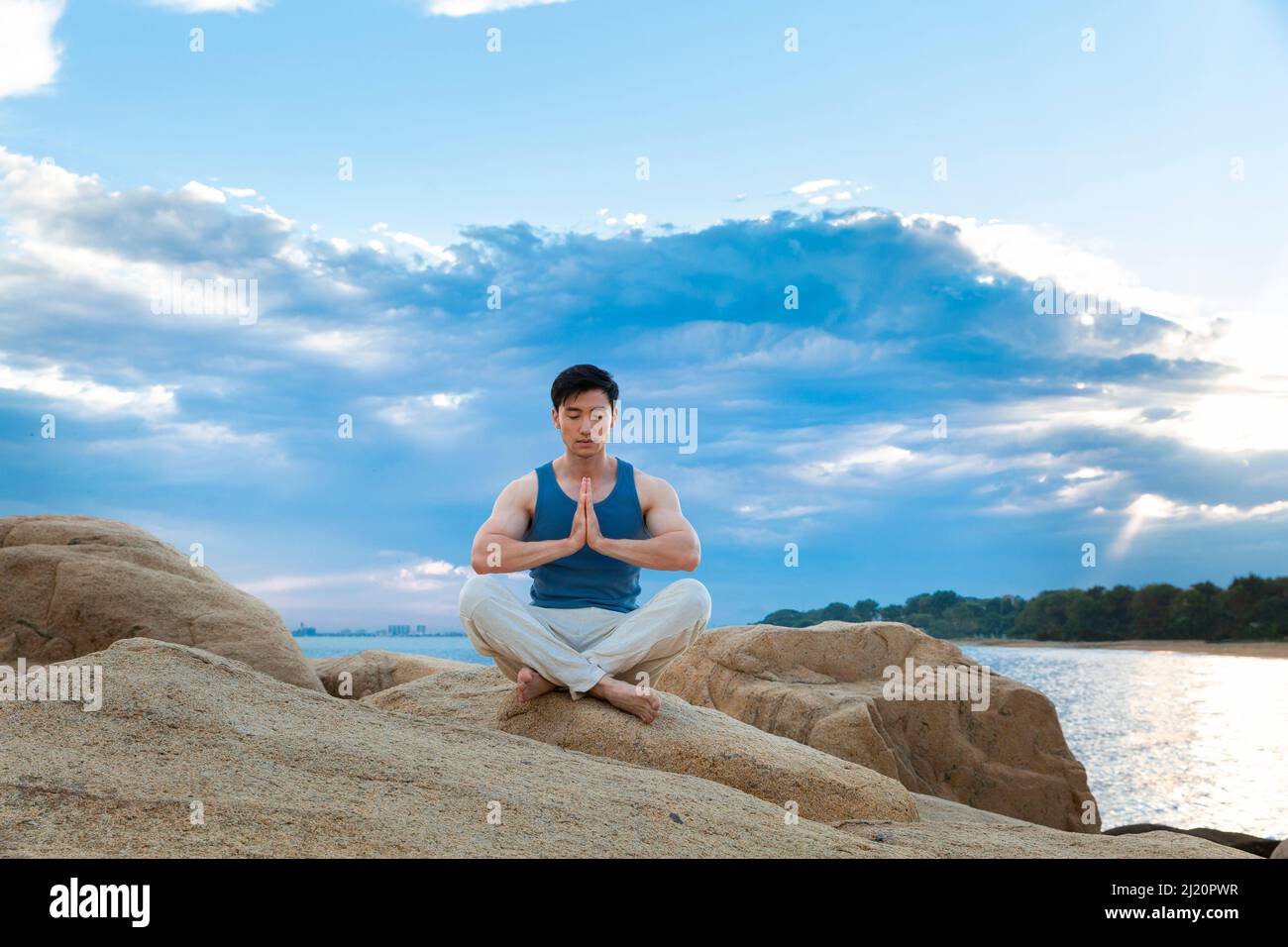 One handsome man meditating hi-res stock photography and images - Alamy