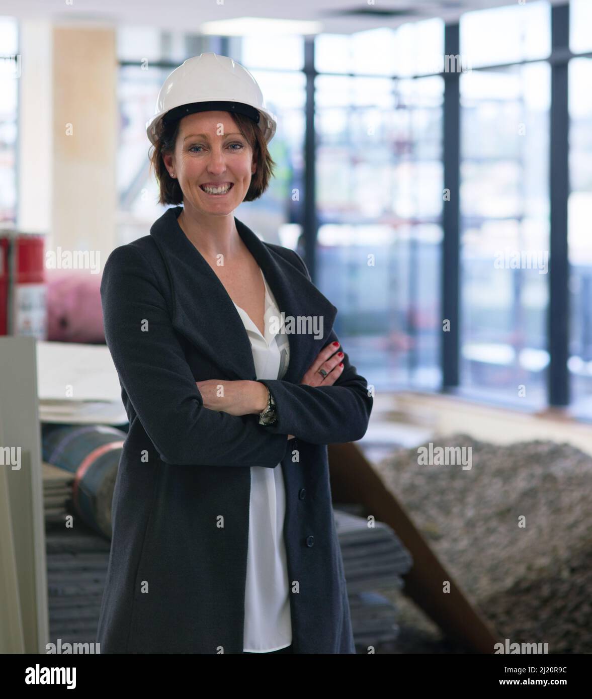 Visions of the future. Portrait of a female construction manager on ...