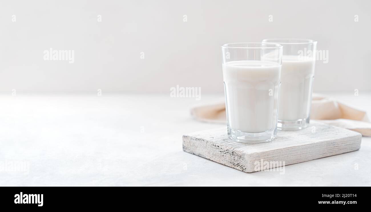 Milk on a light background with space to copy. Horizontal view Stock ...
