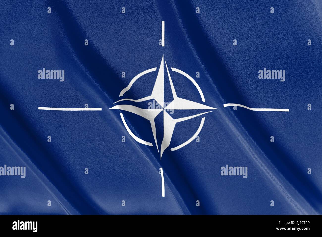 A blue NATO flag fluttering in the wind Stock Photo - Alamy