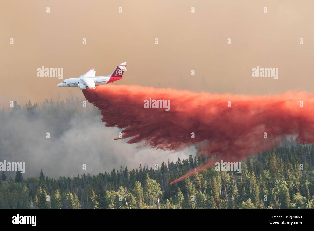 Fire fighting activities with fixed wind aircraft dropping fire ...
