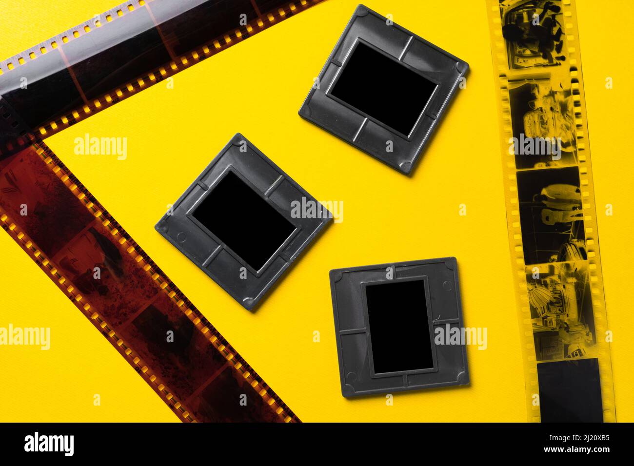 Photography empty slide frames on yellow background Stock Photo - Alamy