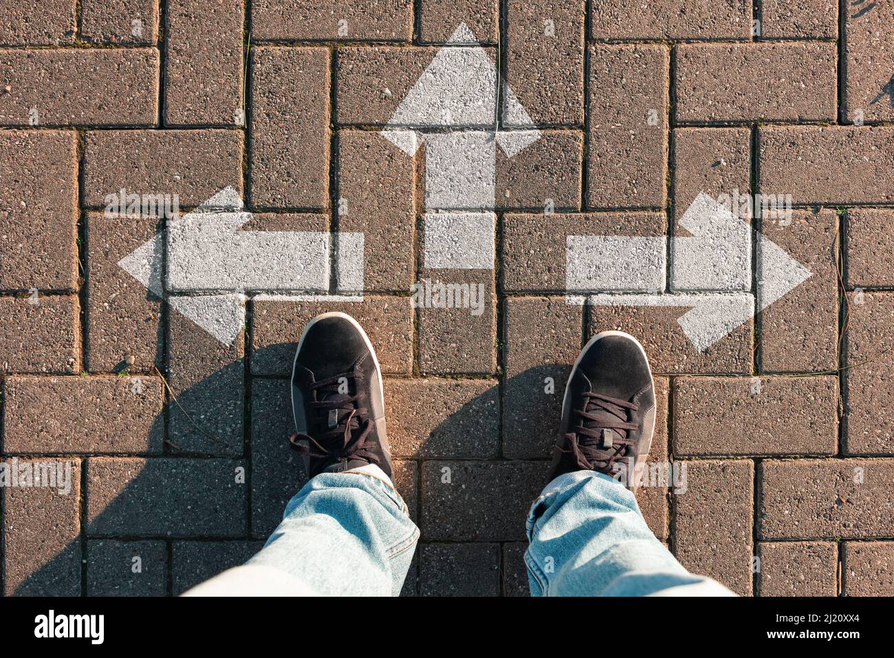 Businessman stands choosing way hi-res stock photography and images - Alamy