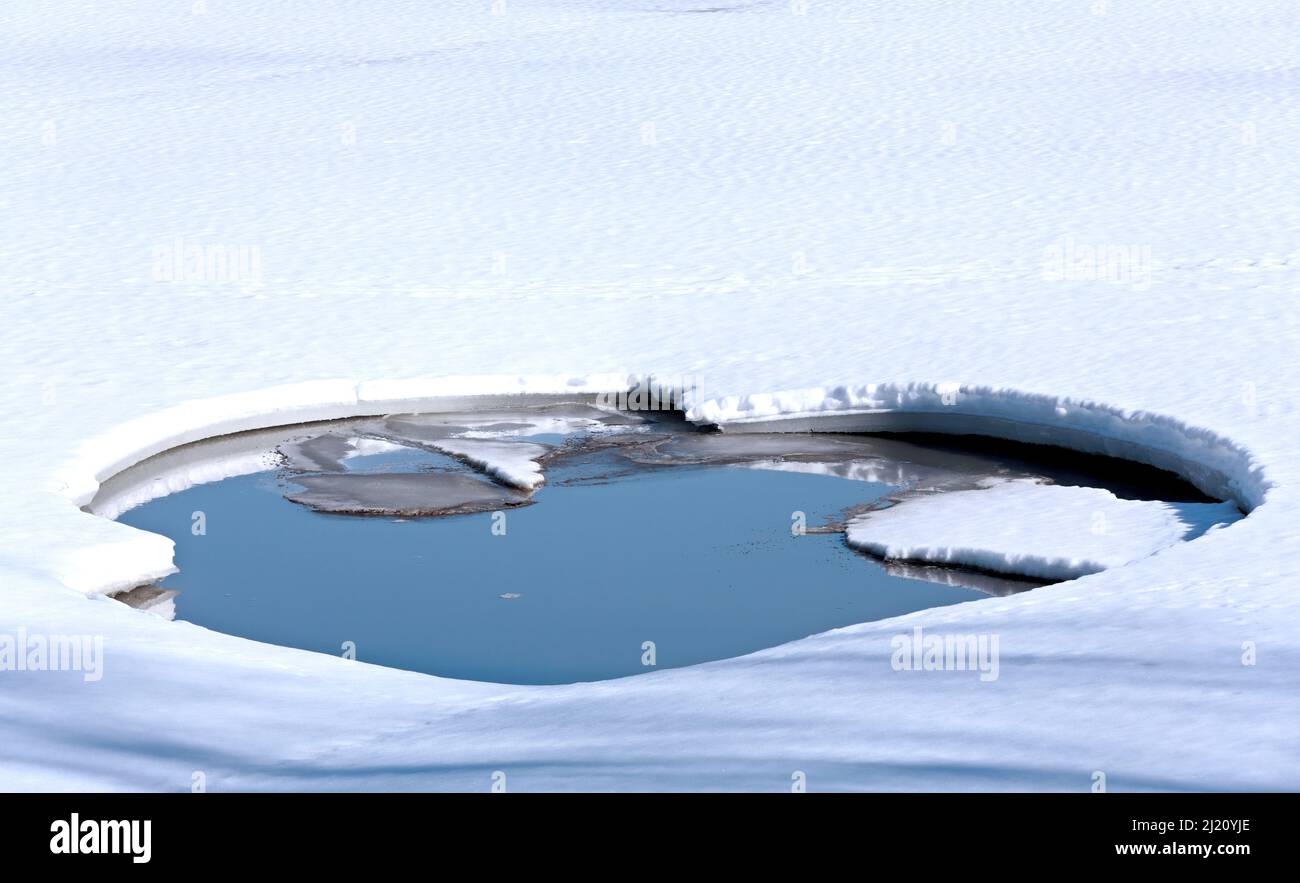 Hole in ice cover hi-res stock photography and images - Alamy