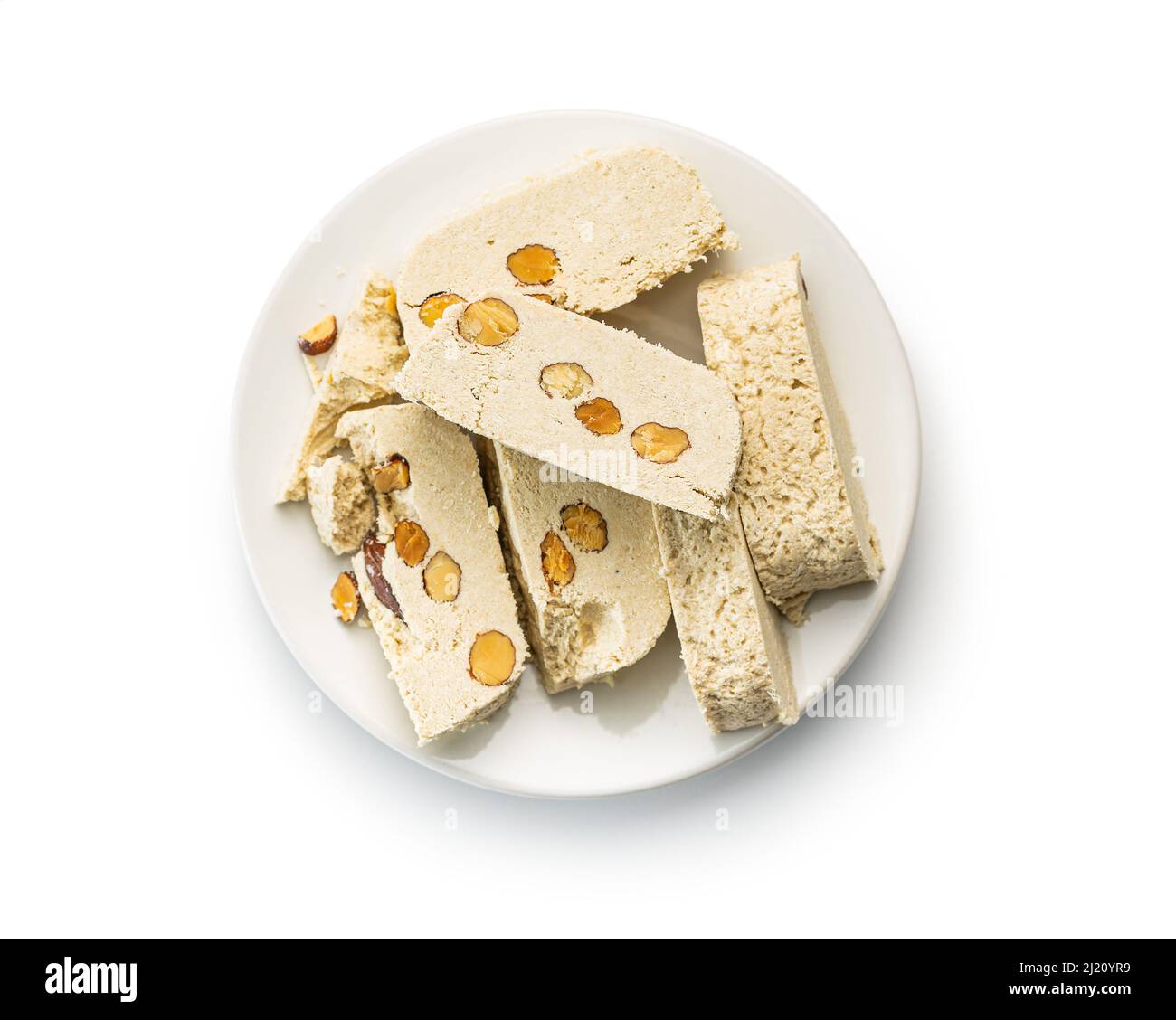 Sweet tahini halva with almonds. Turkish dessert isolated on a white ...