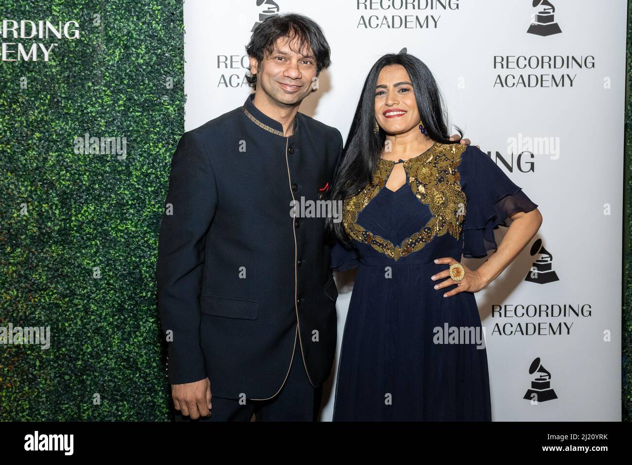 (L-R) Gaurav Shah and Falu Shah attend the 64th Annual Grammy Awards ...
