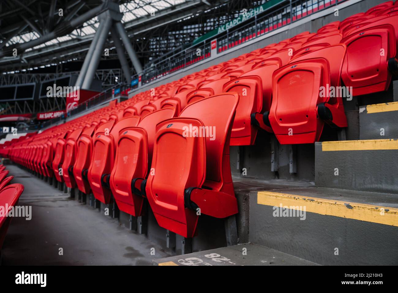 Rows of seats in a football stadium. Bright red stadium seats Stock ...