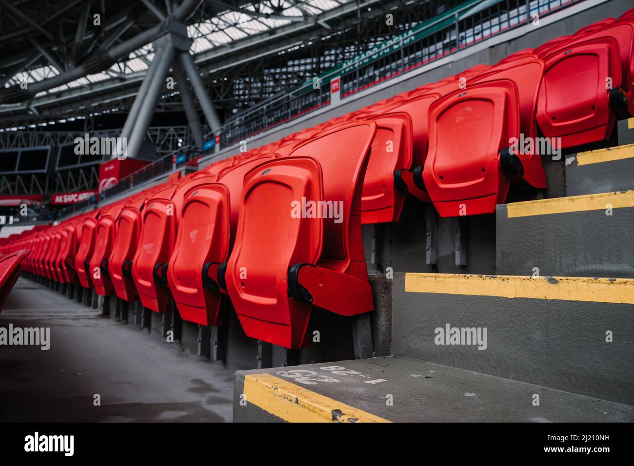 Rows of seats in a football stadium. Bright red stadium seats Stock ...