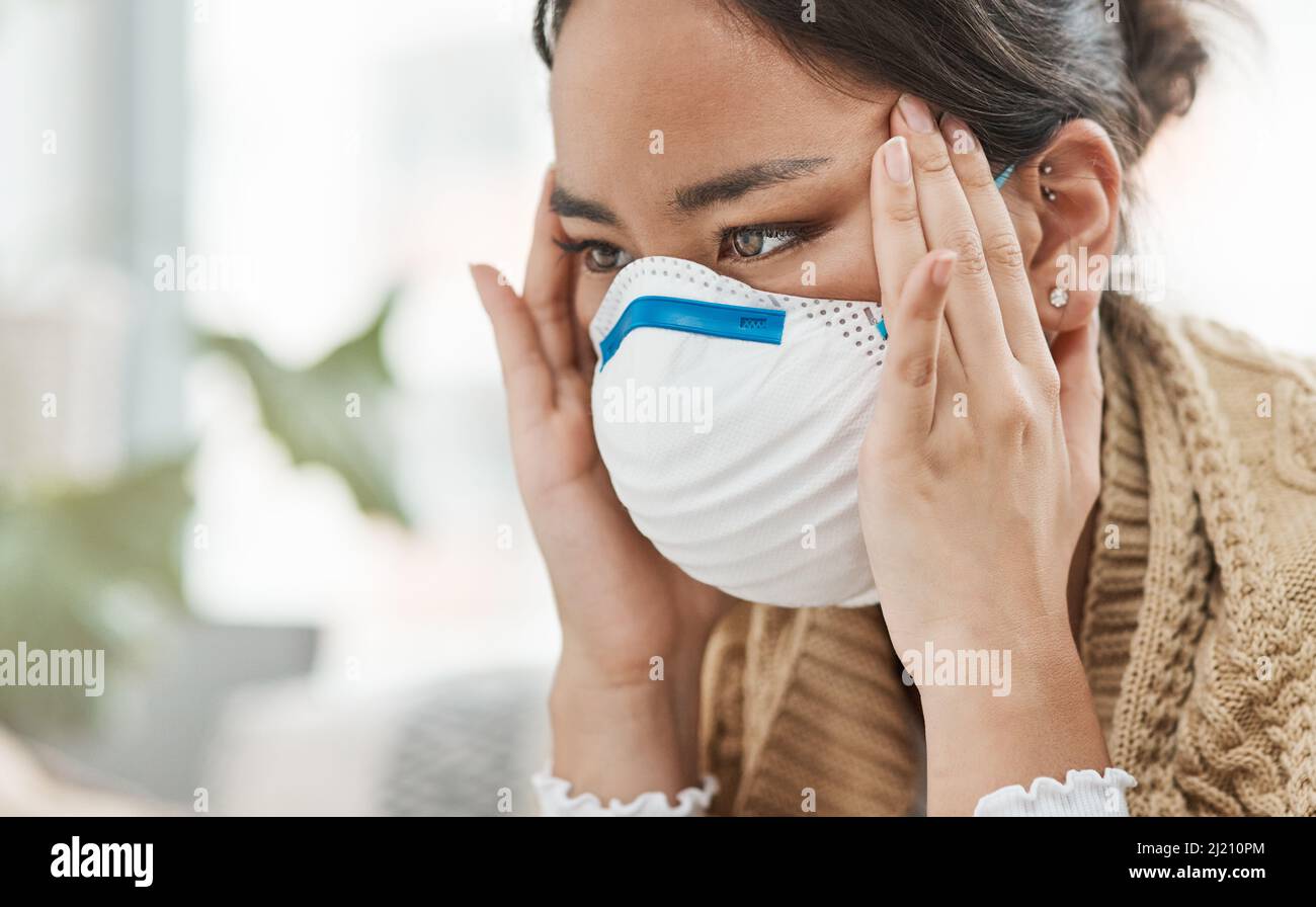 Remember, you are not alone. Cropped shot of a woman wearing a mask ...