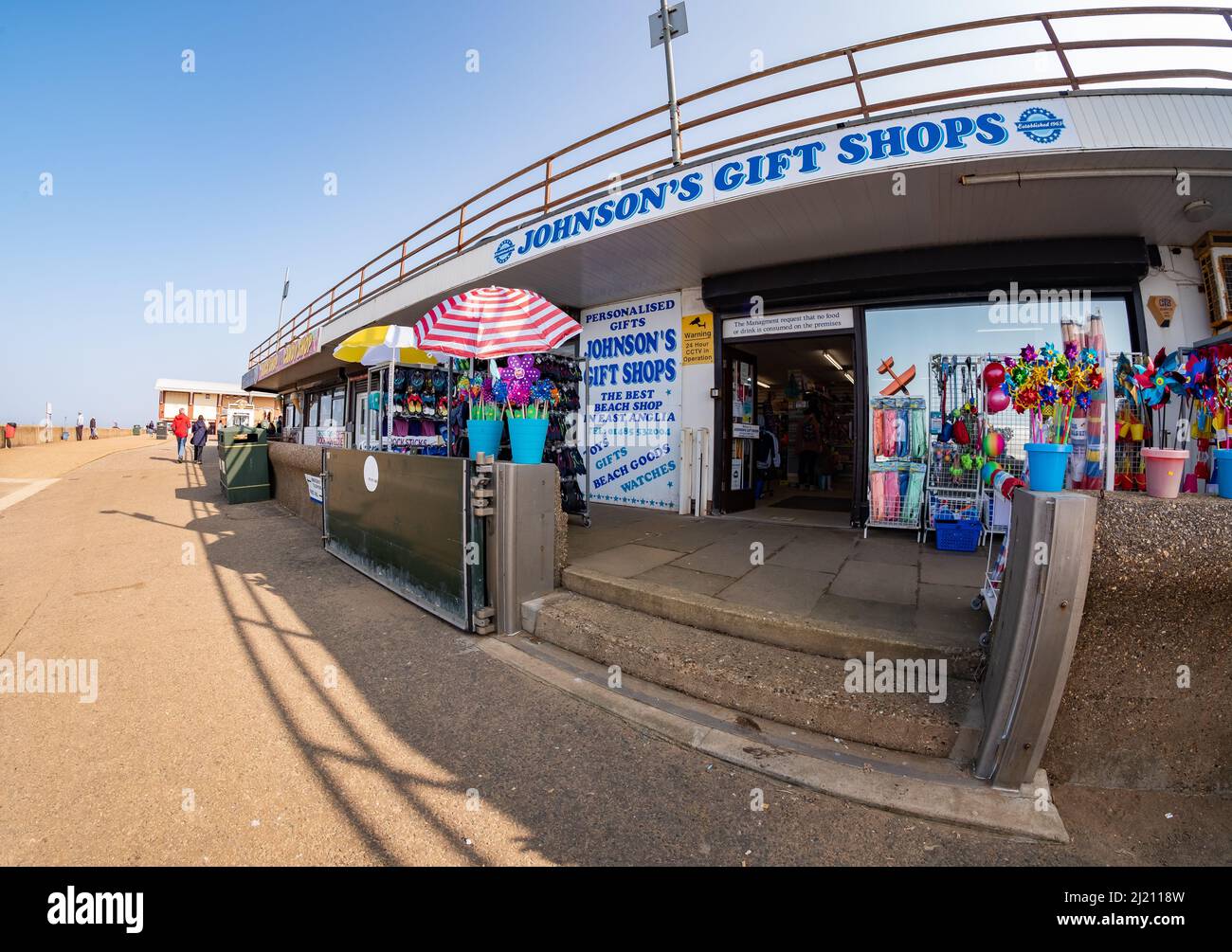 Ultra wide angle fisheye view of Johnson’s gift shop on the promenade ...