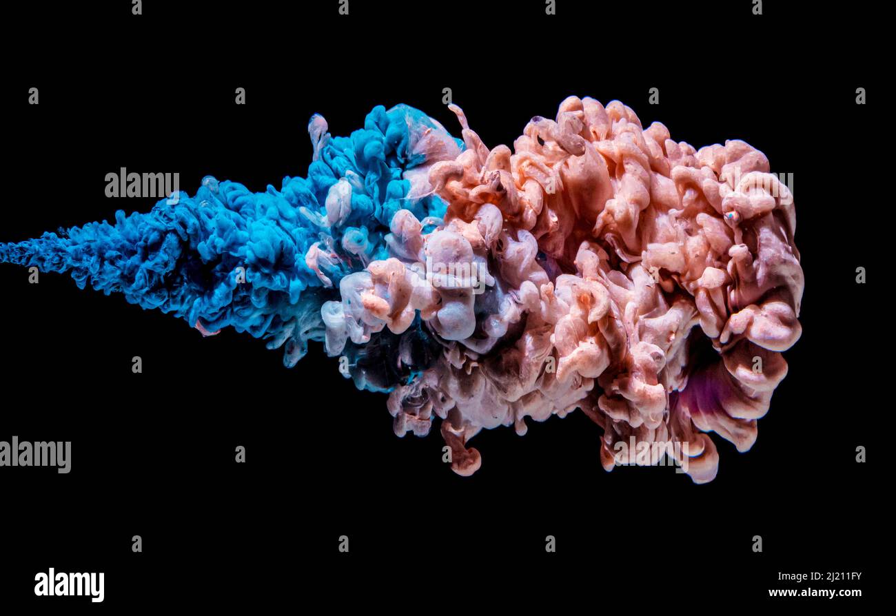 expansion of ink color in water. black background Stock Photo - Alamy