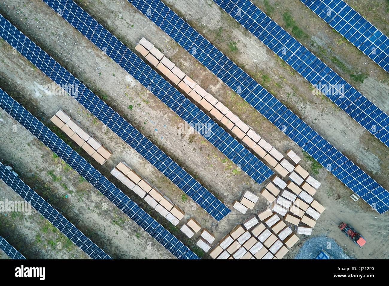 Aerial view of big electric power plant under construction with many ...