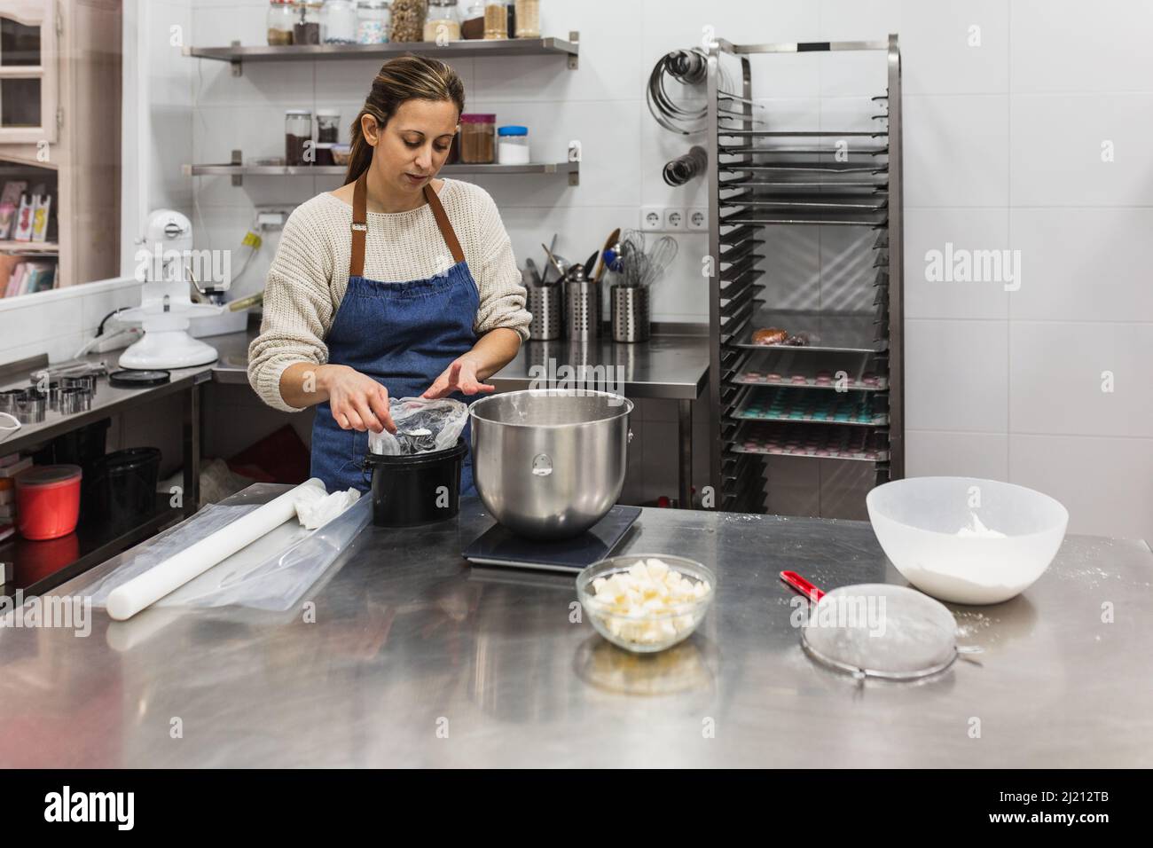 Baker wearing apron preparing hi-res stock photography and images - Alamy