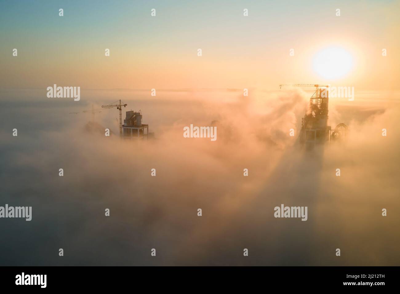 Aerial view of cement factory with high concrete plant structure and ...