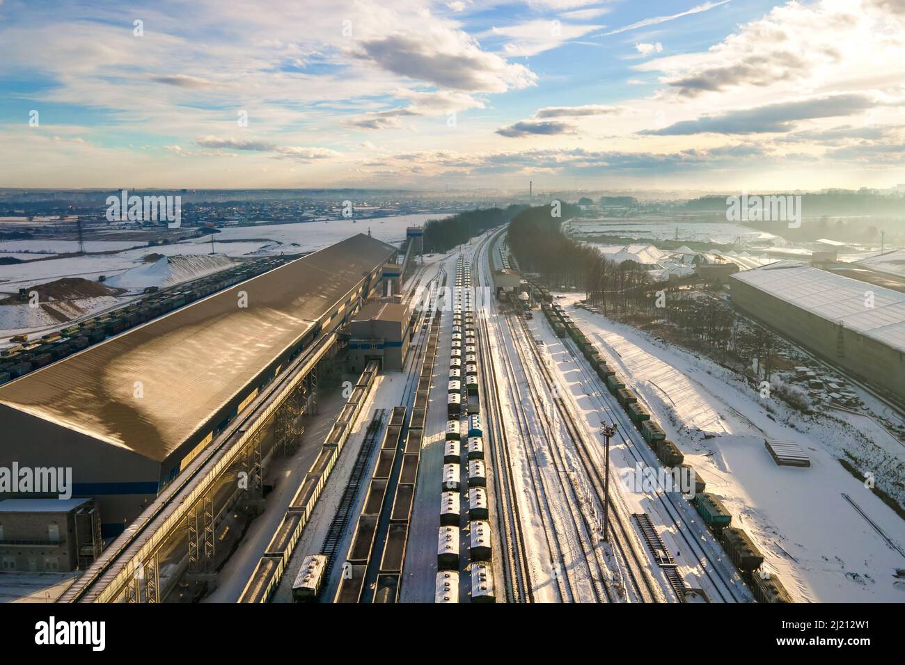 Aerial view of cargo train loaded with crushed sandstone materials at ...