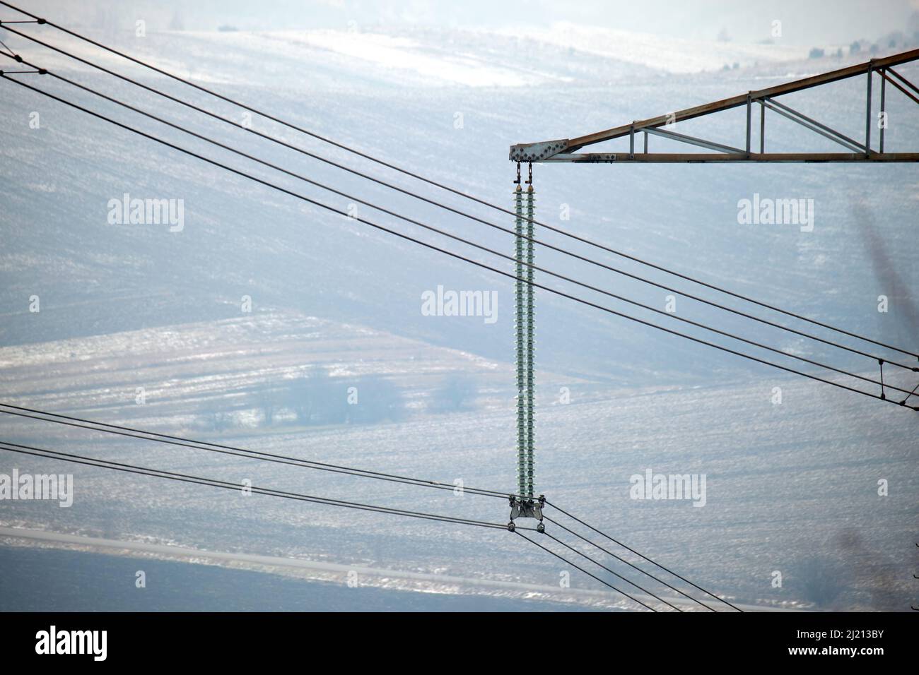 Electric power lines divided by safe guard insulating frame transfening ...