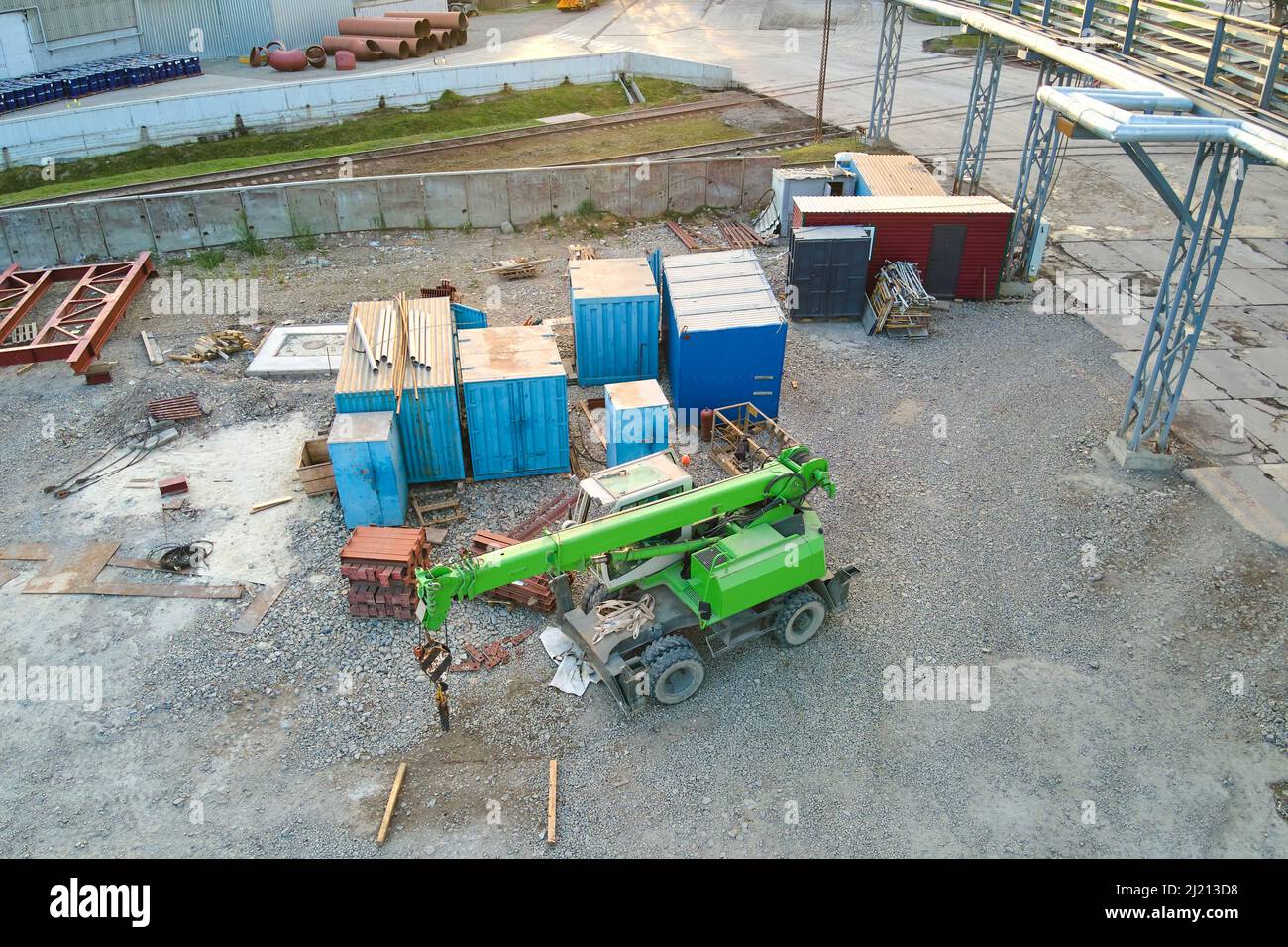 Lifting crane tractor on industrial construction site. Heavy duty ...