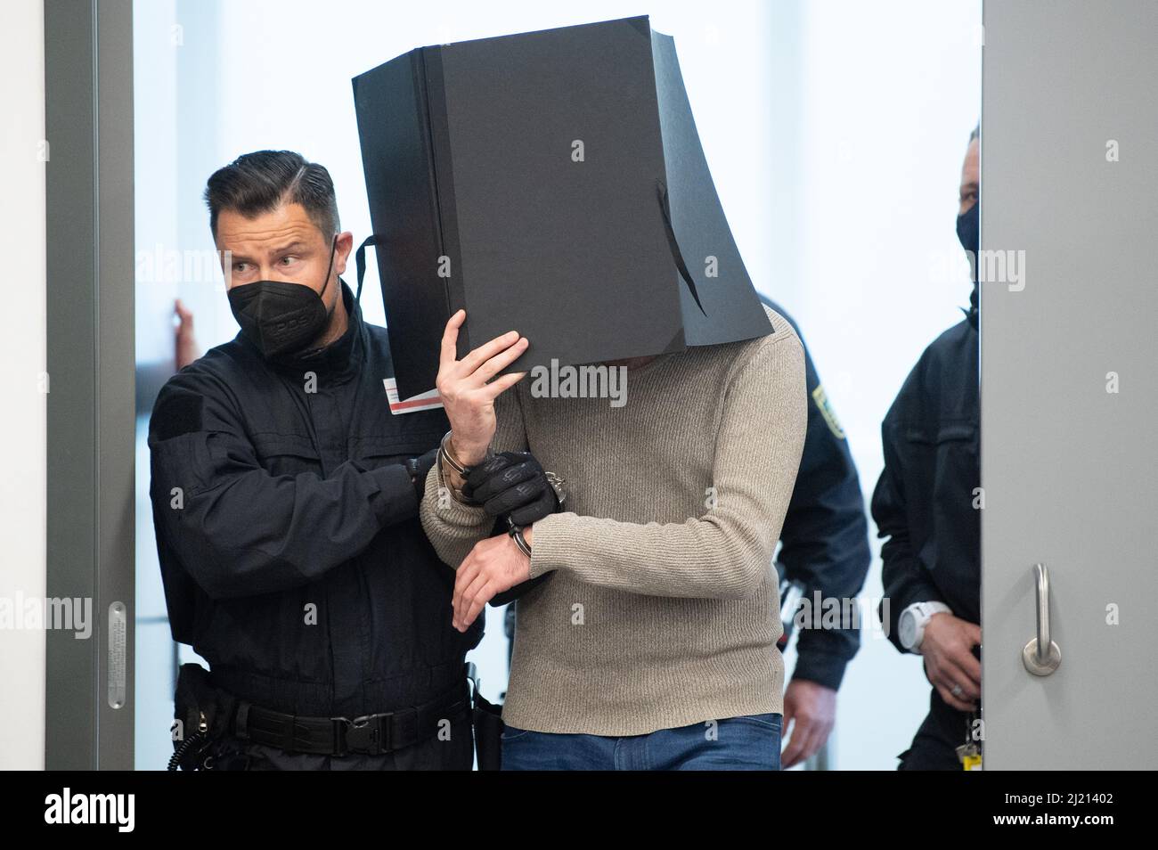Dresden, Germany. 29th Mar, 2022. A defendant (M) in the trial of the ...