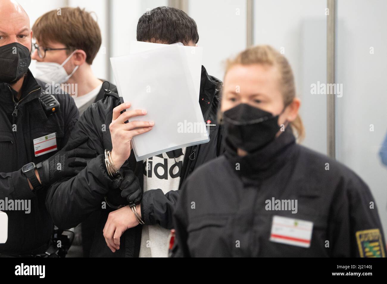 Dresden, Germany. 29th Mar, 2022. A defendant (M) in the trial of the ...