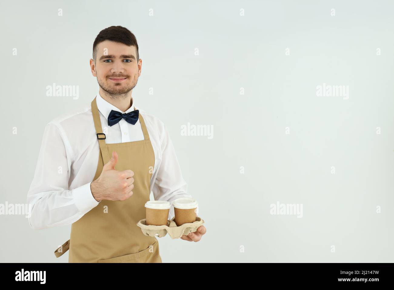 Concept of profession with young man waiter Stock Photo - Alamy