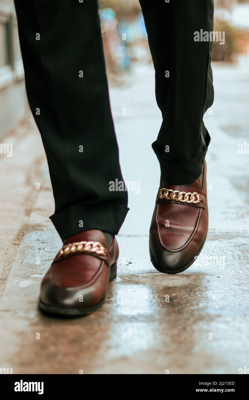 Black chain loafers hi-res stock photography and images - Alamy